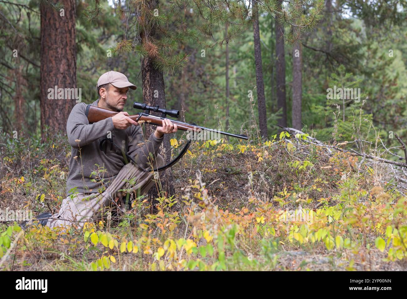 Holding a sniper rifle hi-res stock photography and images - Alamy