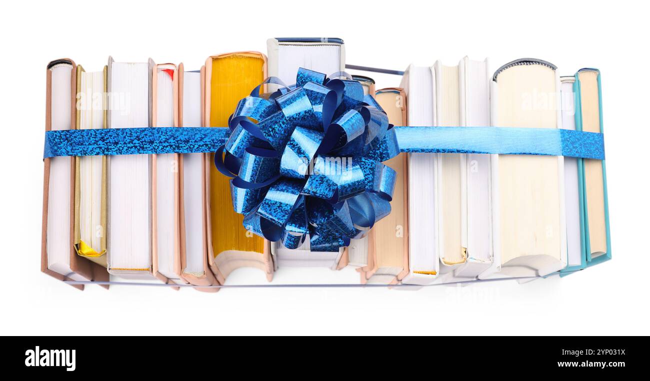 Books with blue bow as gift isolated on white, top view Stock Photo - Alamy
