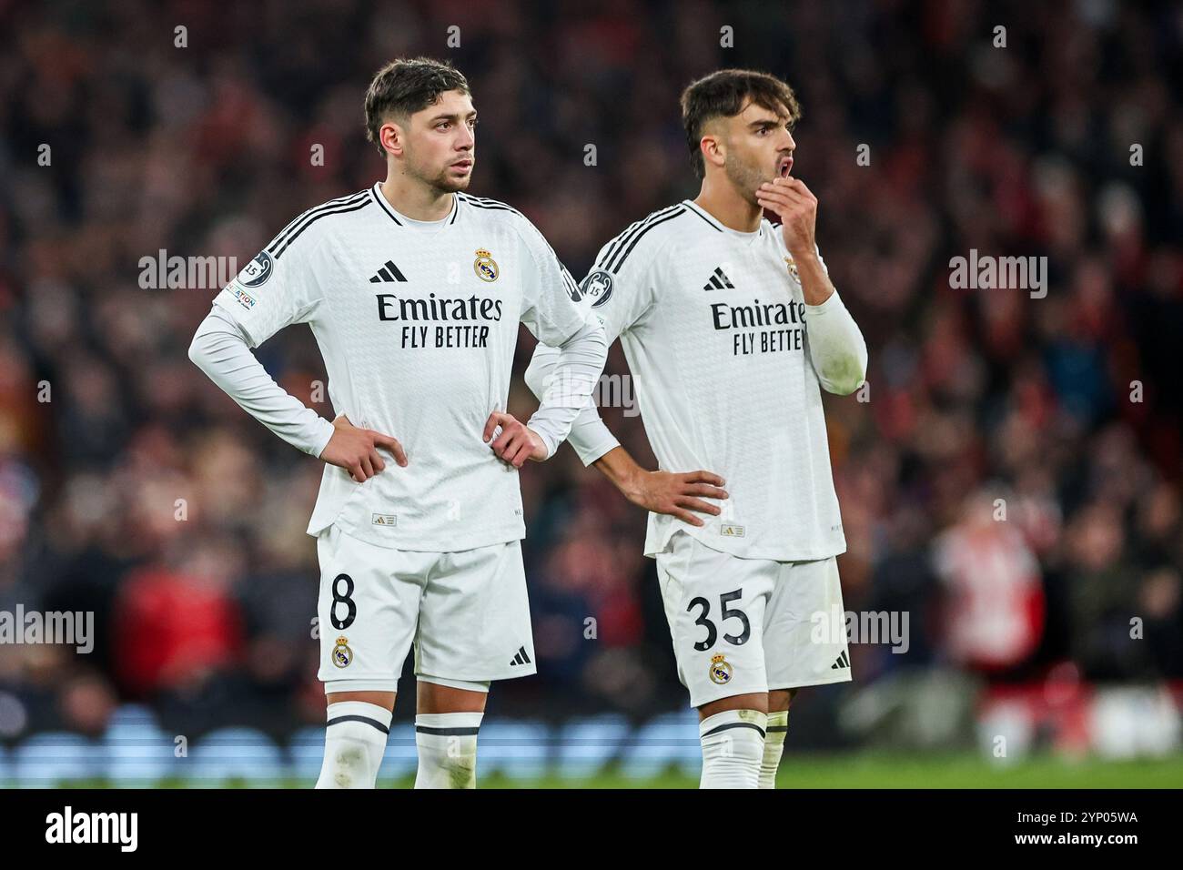 Federico Valverde and Raúl Asencio of Real Madrid look dejected from ...