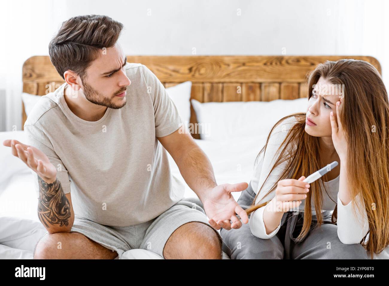 Problems with conceiving concept. Frustrated husband and wife sitting ...