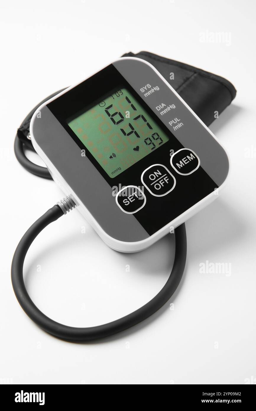Blood pressure measuring device on light grey background Stock Photo ...