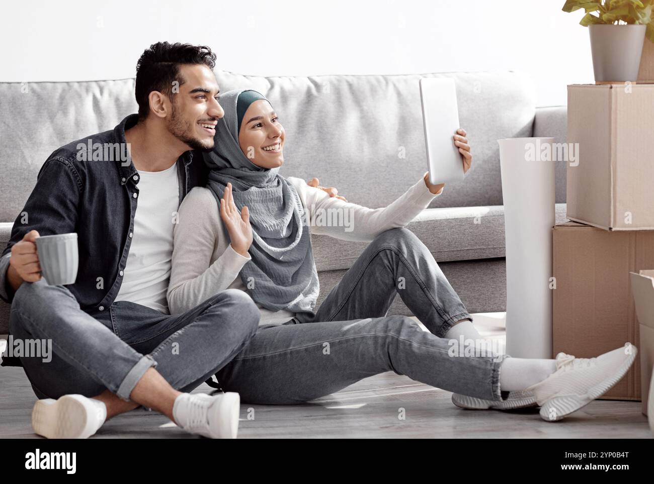 Happy middle-eastern family having online party with friends Stock ...