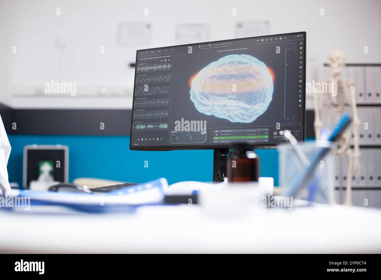 In empty clinic office, pc monitor displays detailed brain image for ...
