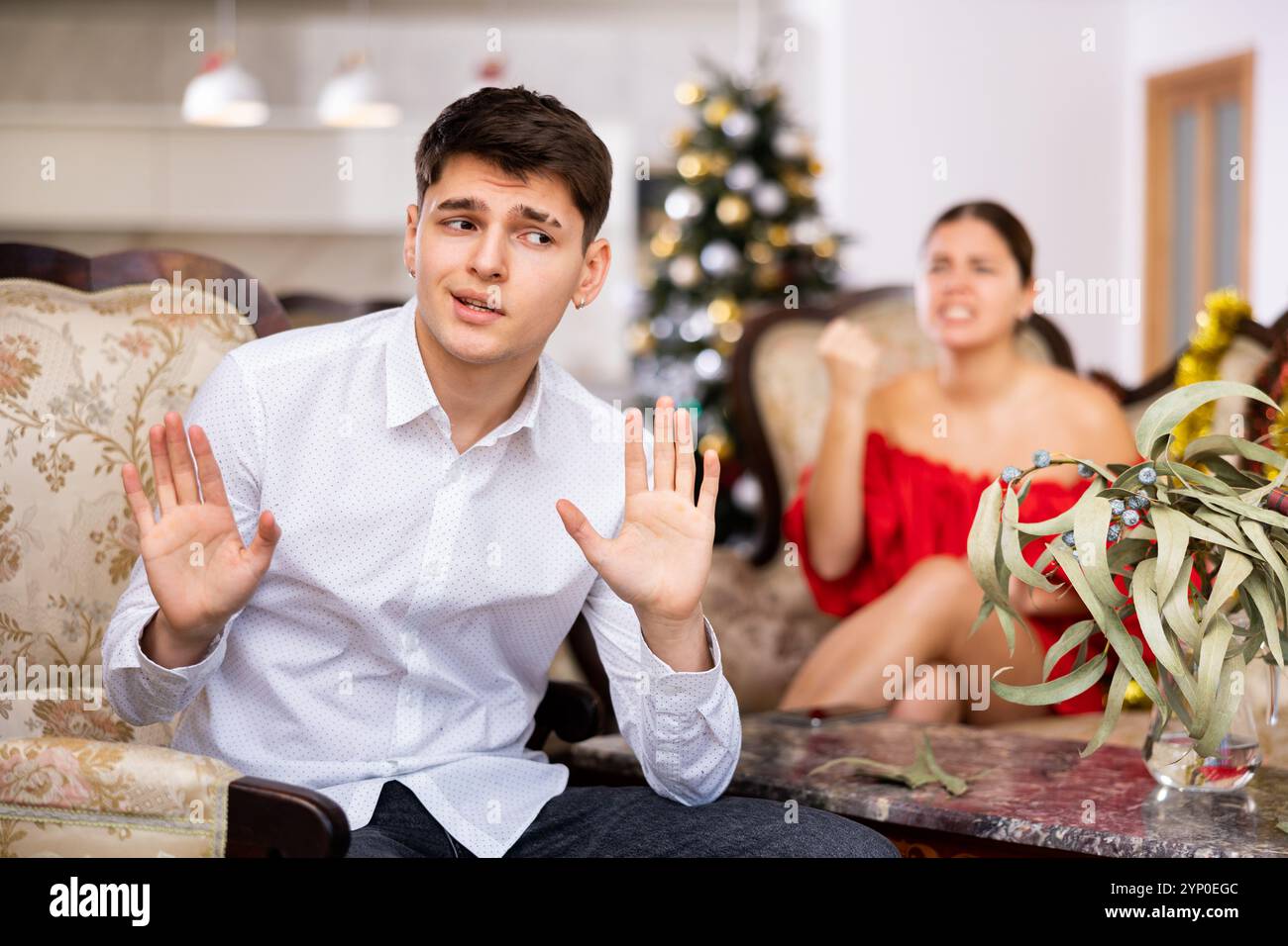 Emotional distressed young male and female screaming at each other ...