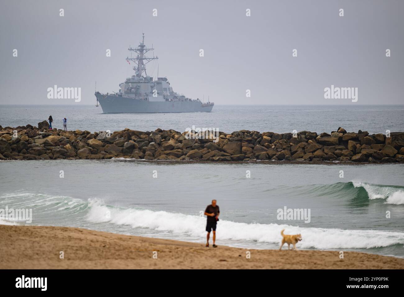 USS Curtis Wilbur (DDG 54) makes its way past a jetty along Silver ...
