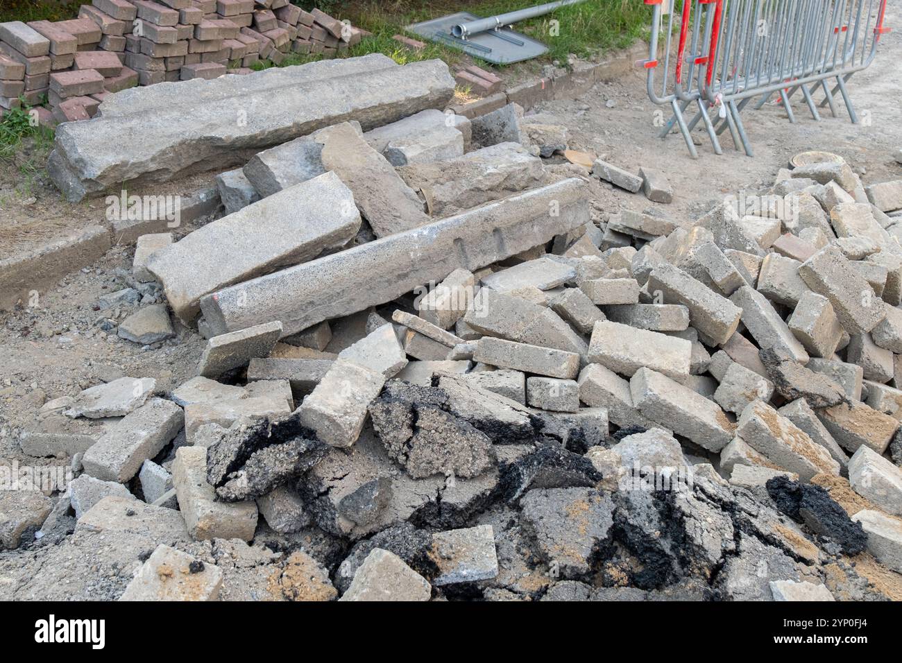 heap of construction waste debris from dismantled asphalt roads and ...