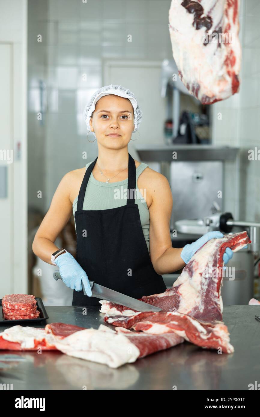 Female butcher, experienced and skilled Stock Photo - Alamy