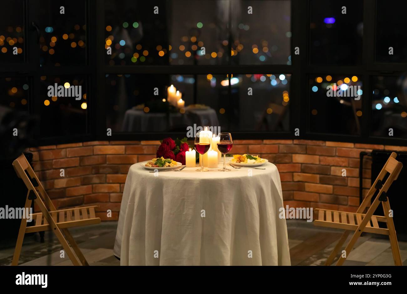 Served Table With Food And Burning Candles In Restaurant Interior Stock ...