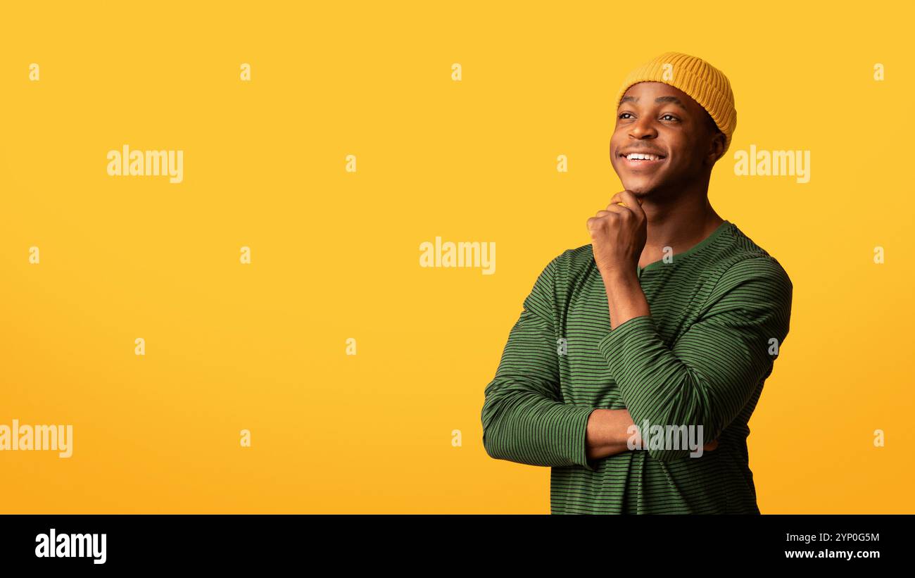Good Offer. Pensive Young African-American Guy Looking At Copy Space ...