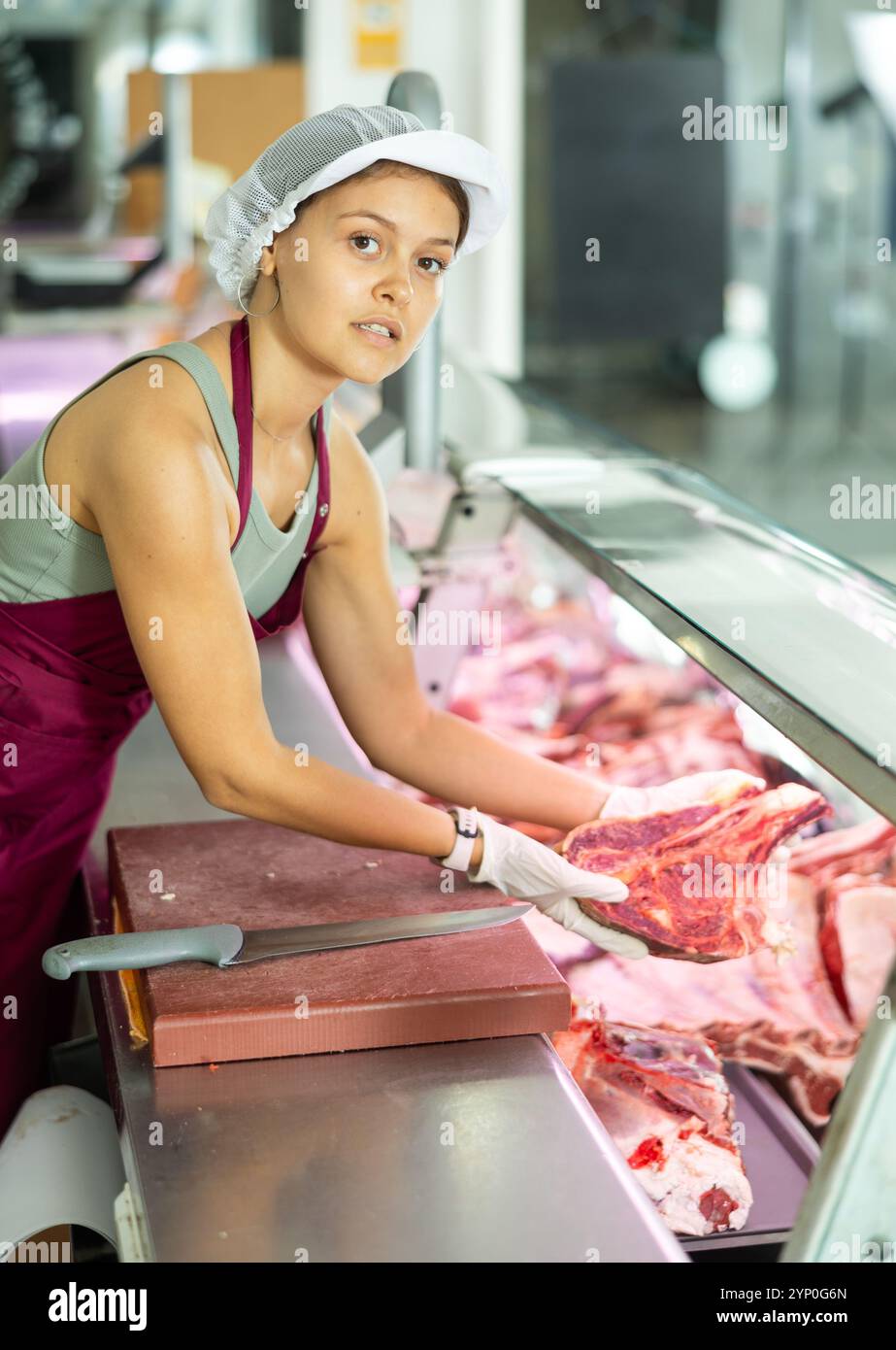 woman behind counter showcases Stock Photo - Alamy