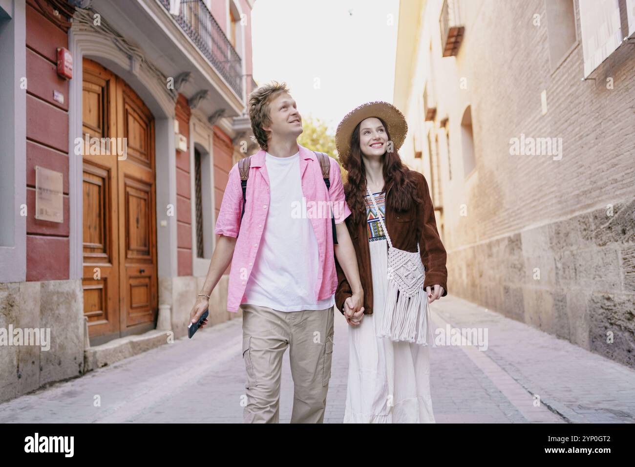 A Loving Couple Happily Strolling Hand in Hand Through a Beautifully ...