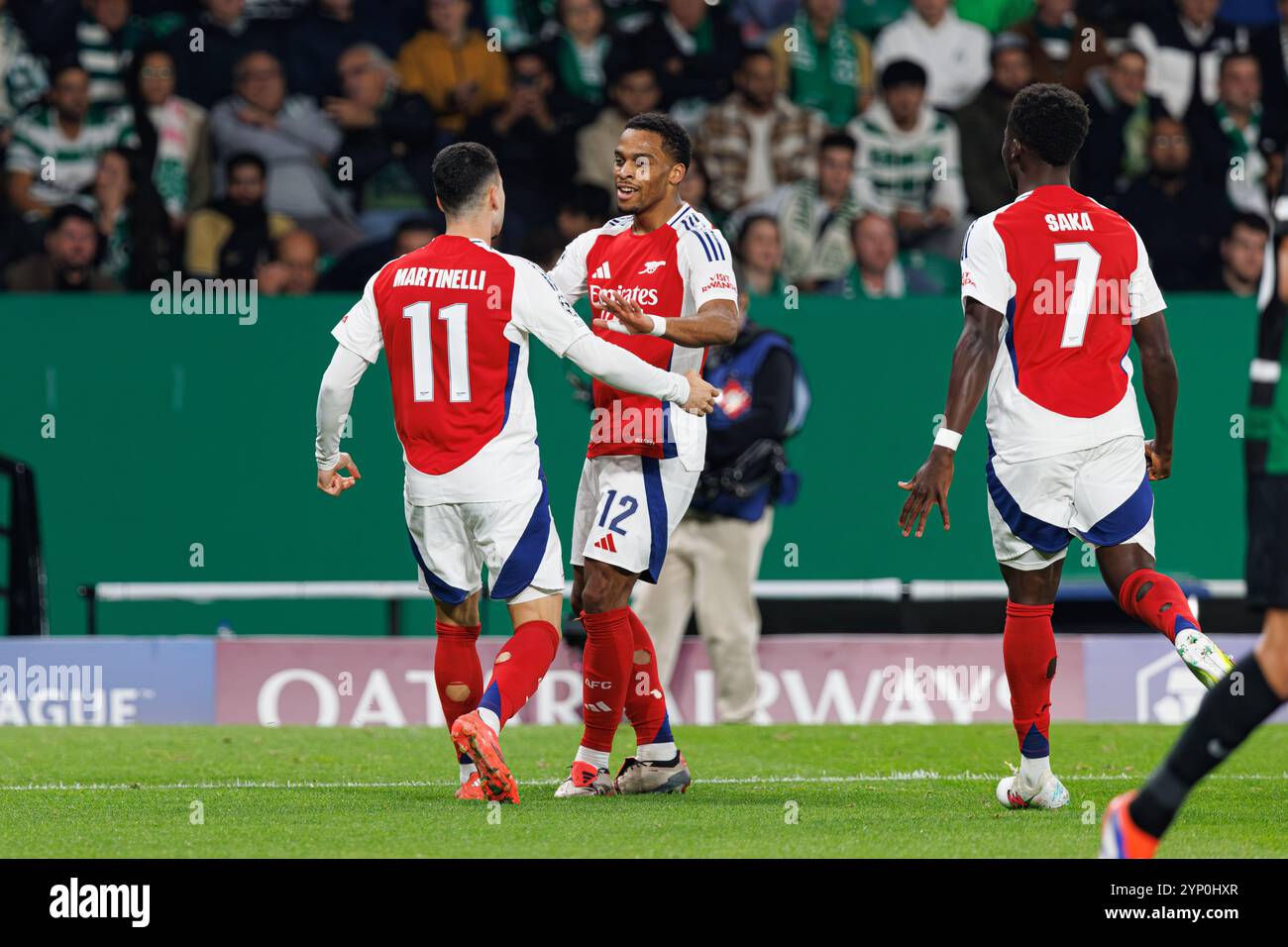 Gabriel Martinelli, Jurrien Timber, Bukayo Saka (Arsenal FC) seen in action celebrating after ...
