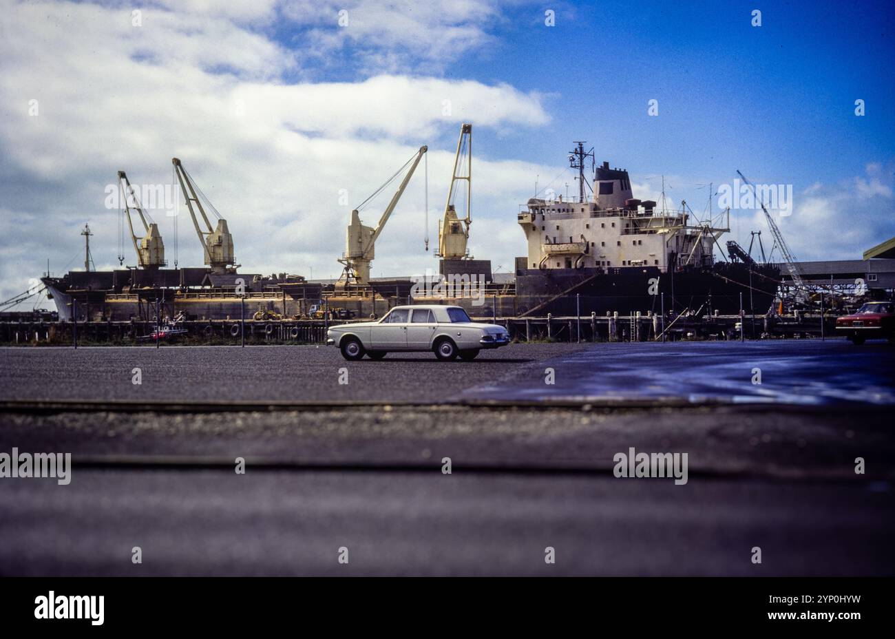 Vintage photo of a cargo ship in port Stock Photo - Alamy
