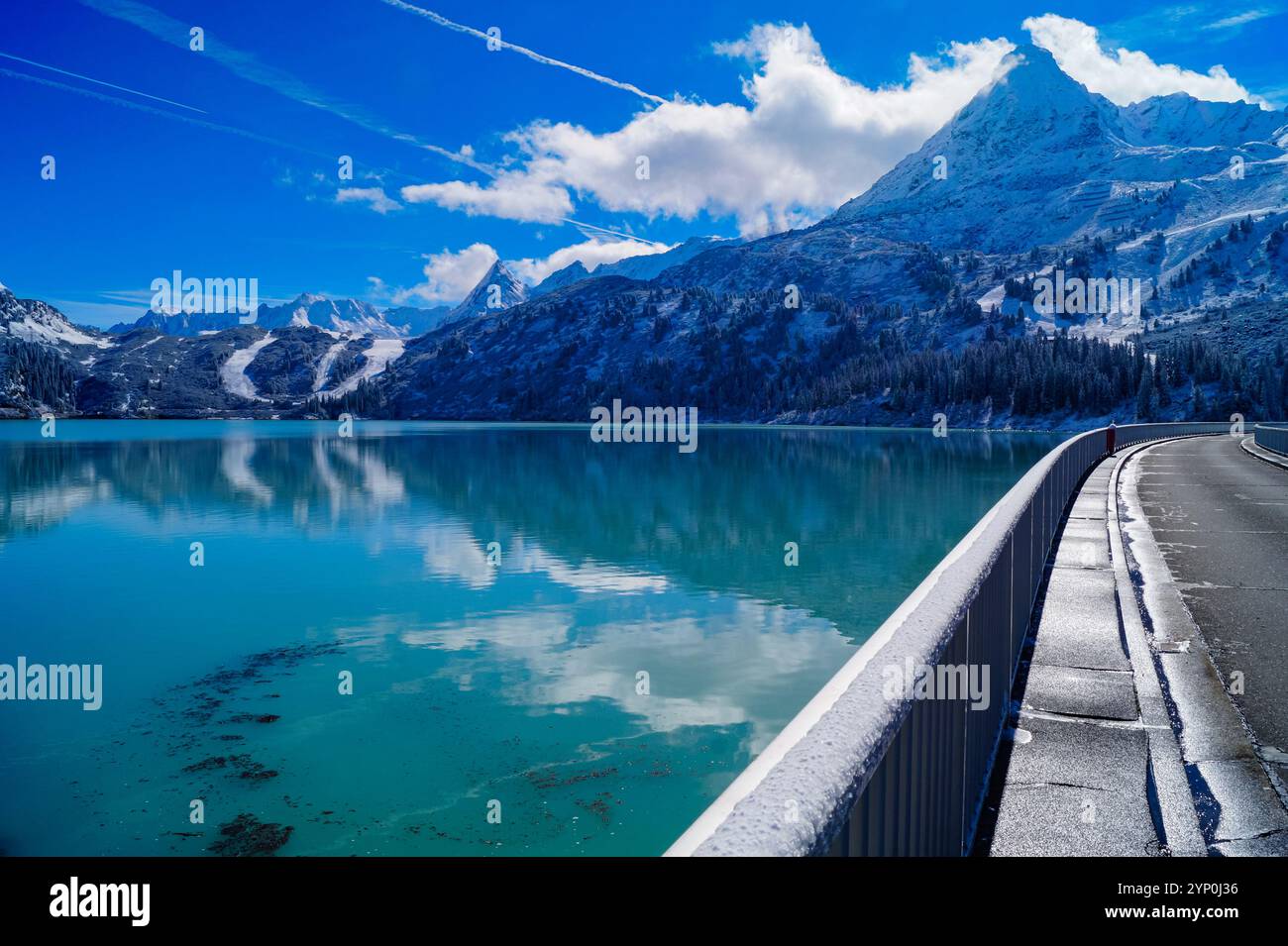 A view of the picturesque alpine lake with azure water and reflections ...