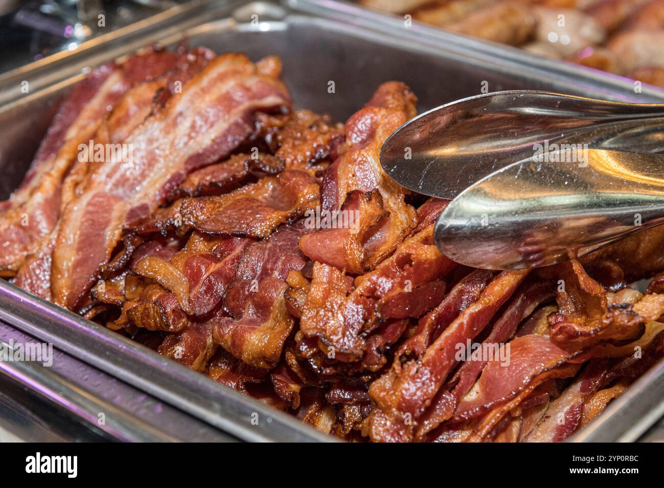 Detail photo of bacon strips in restaurant breakfast buffet, USA Stock ...