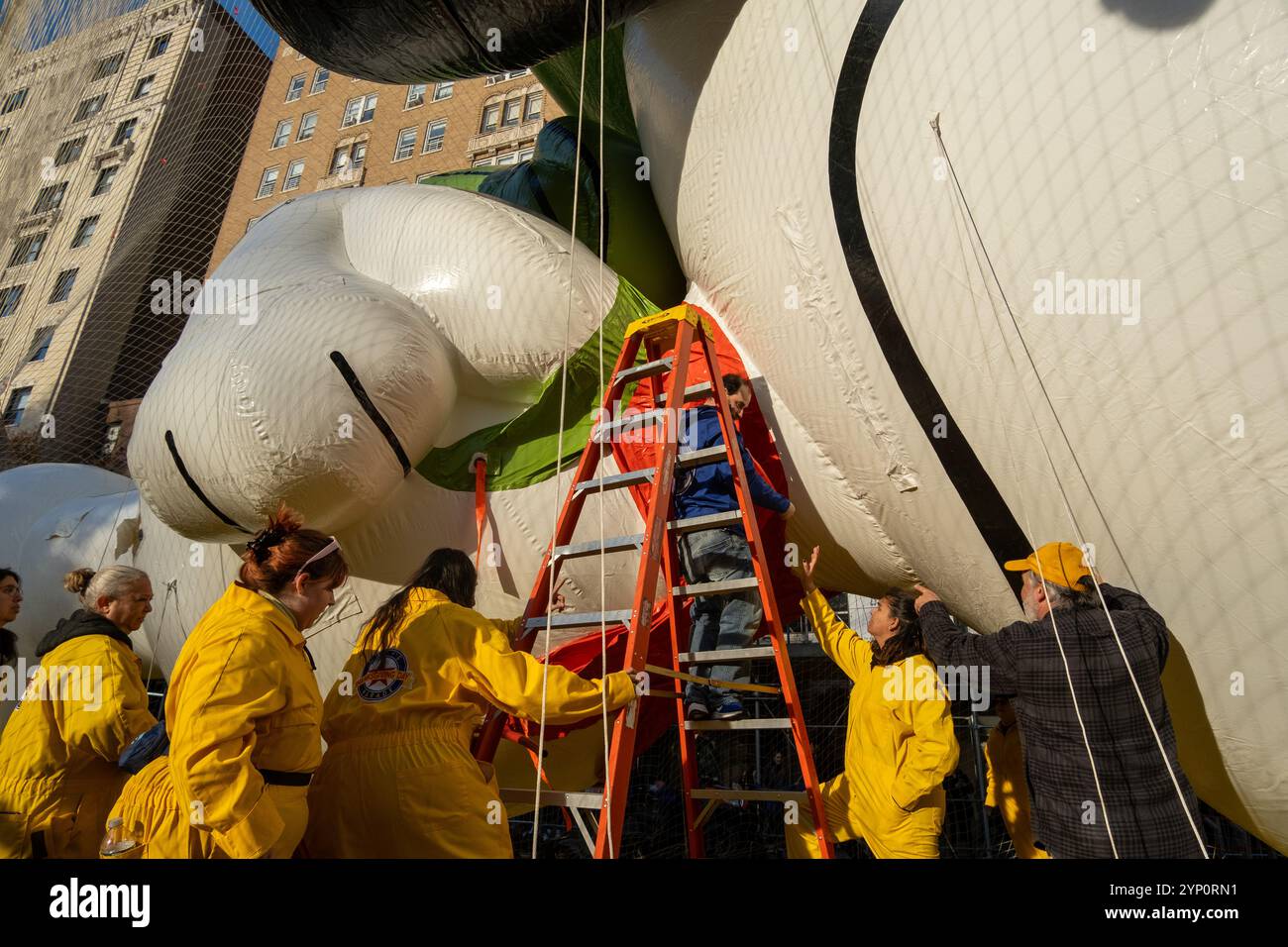 USA. 27th Nov, 2024. The Snoopy Peanuts balloon. Balloons and floats ...
