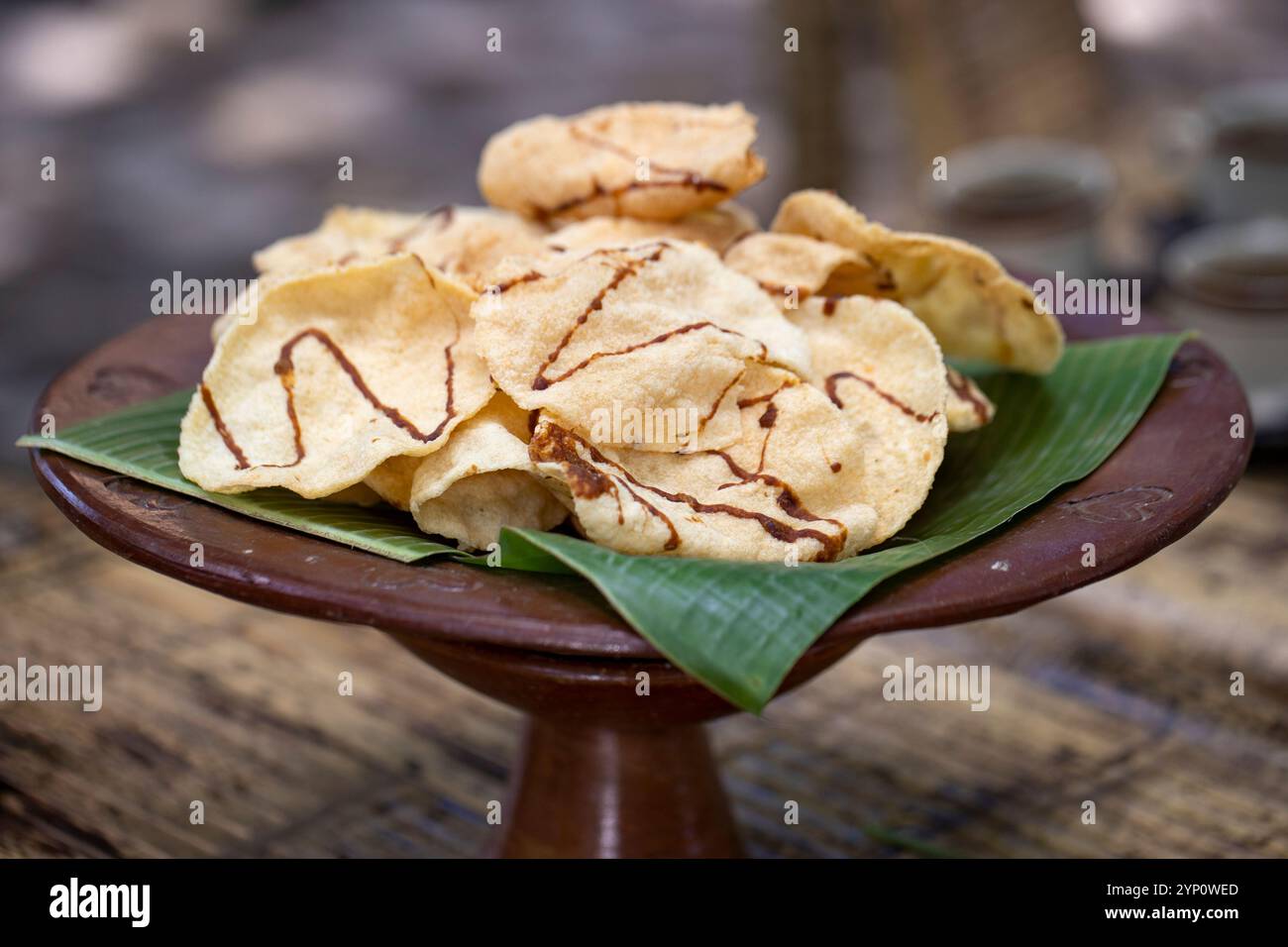 A platter of crispy cassava crackers, a popular snack in Indonesia ...