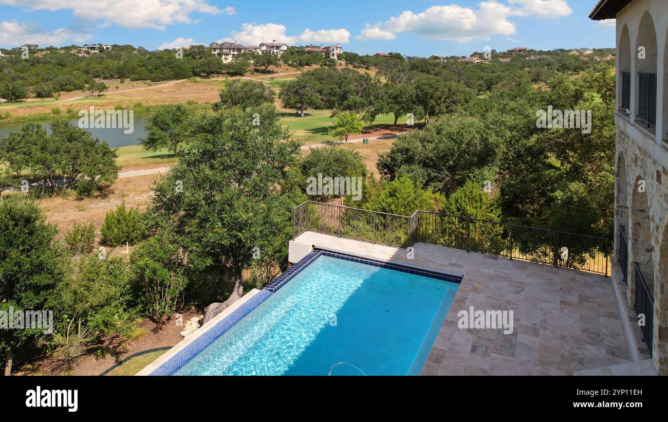 Luxury patio overlooking swimming pool hi-res stock photography and ...