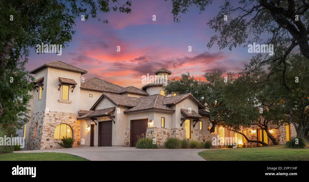 A stunning modern house showcases its unique architecture at sunset ...