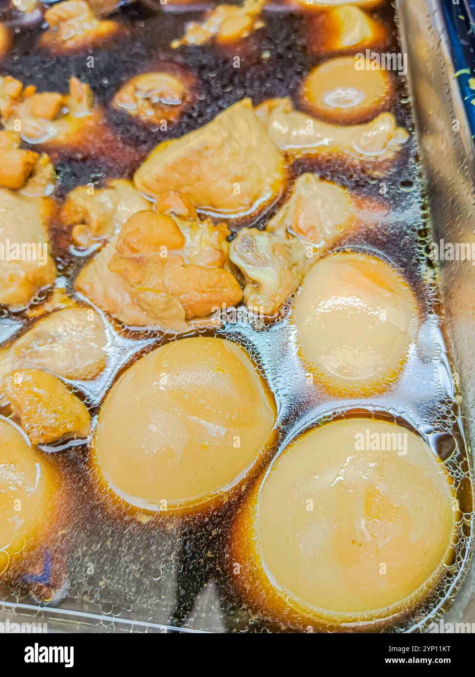 Egg and pork in sweet brown sauce Stock Photo - Alamy