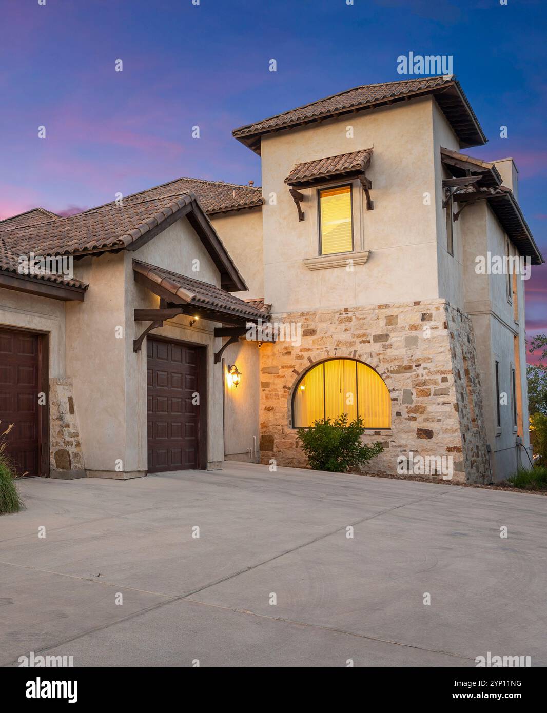 Beautiful sunset view of a charming rustic house with elegant ...