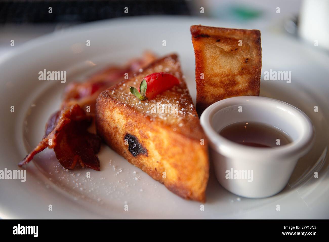Cinnamon Raisin French Toast with maple syrup Stock Photo - Alamy