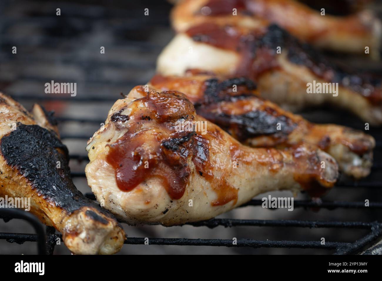 Cooking bbq chicken legs hi-res stock photography and images - Alamy
