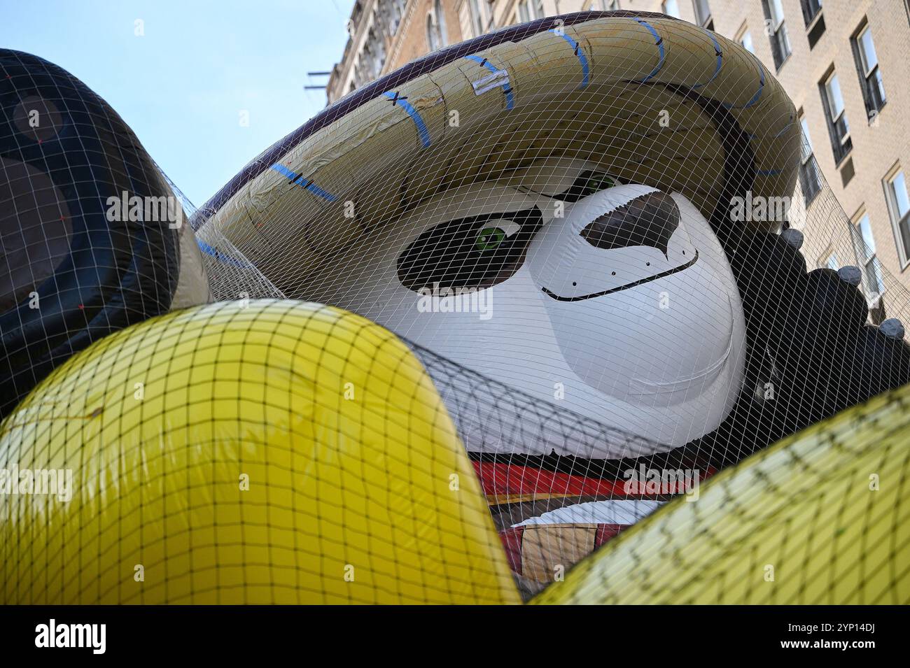 New York, USA. 27th Nov, 2024. Po from Kung Fu Panda balloon seen under ...