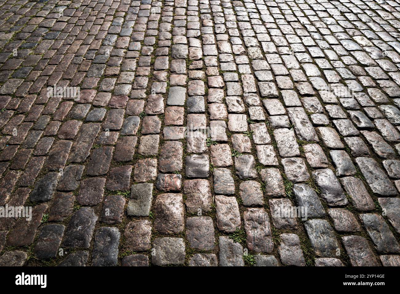 Stone road. Pavement texture. Stonework background for design. Granite cobblestoned pavement ...