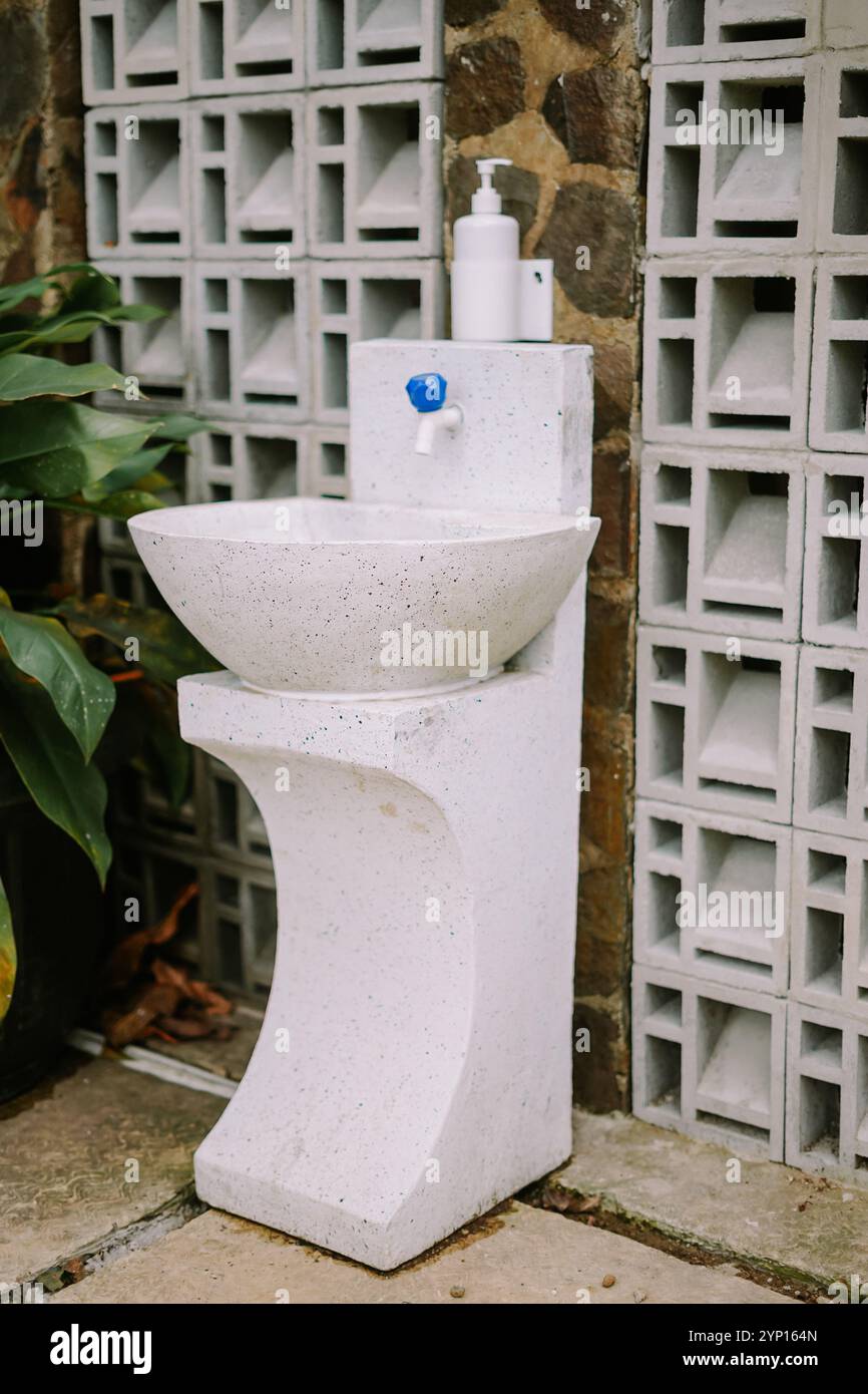 Outdoor sink with a handwashing station, complete with liquid soap ...