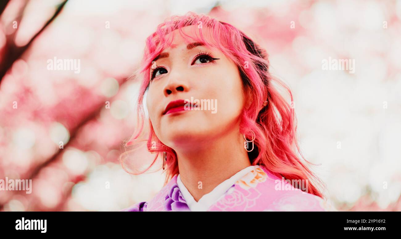 Cherry blossom, park and face of woman with kimono, thinking or outdoor ...