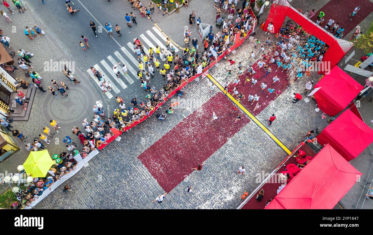 Marathon running race, aerial view of start and finish line with many ...