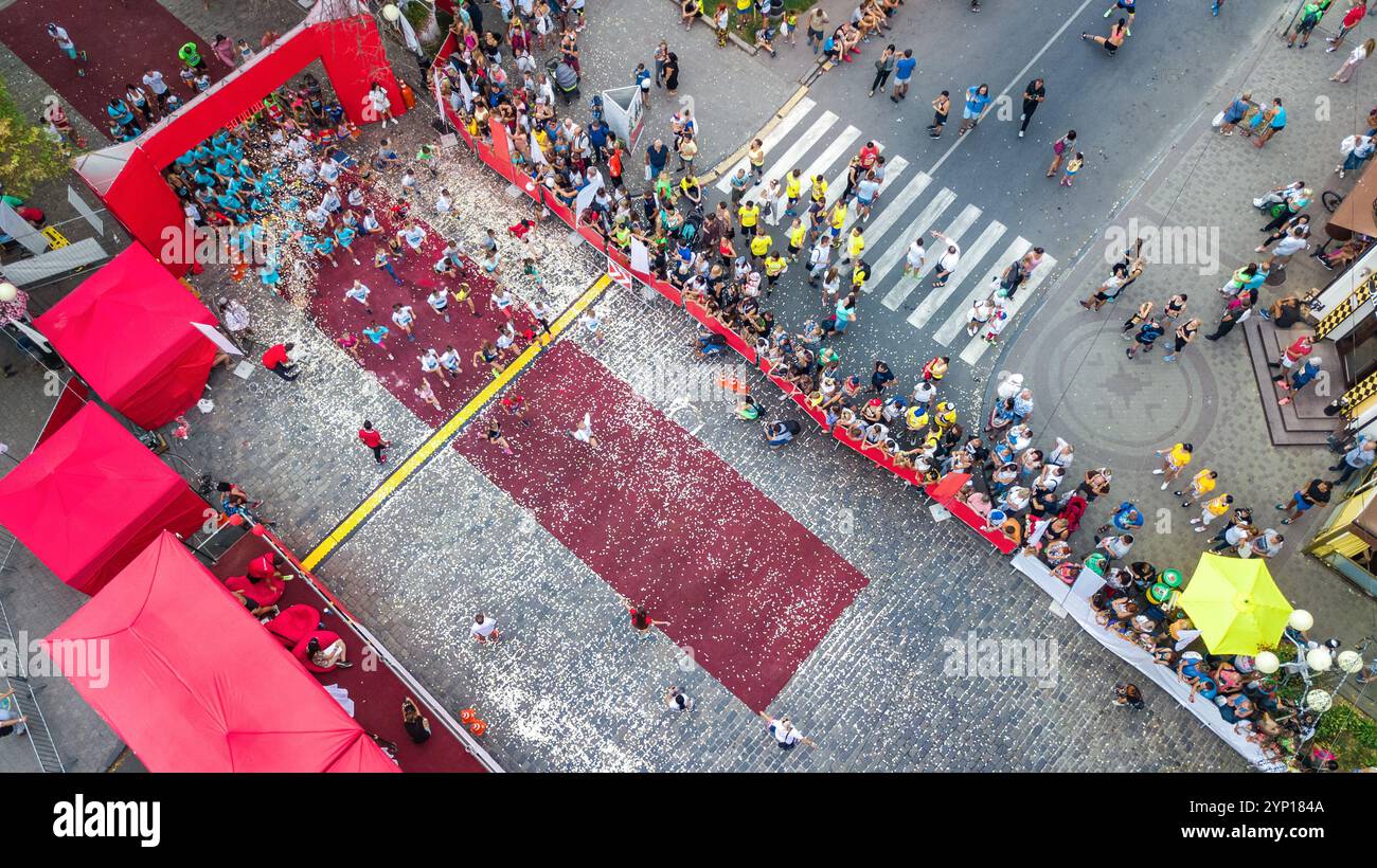 Marathon running race, aerial view of start and finish line with many ...