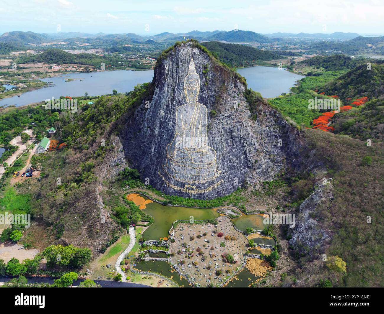 Aerial view of beautiful landscape of laser carved Buddha image on ...