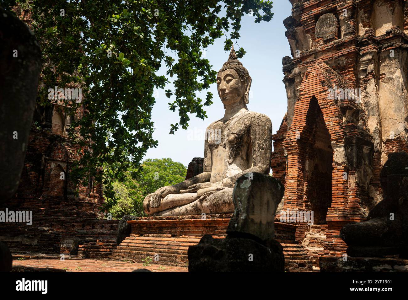 Buddha statue in Wat Mahathat temple, Ayutthaya, Thailand. Ayutthaya is ...