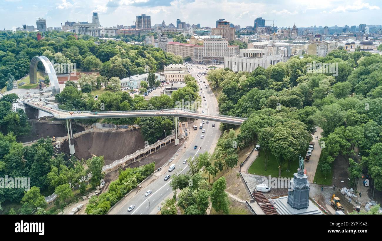 Aerial drone view of new pedestrian cycling park bridge construction ...