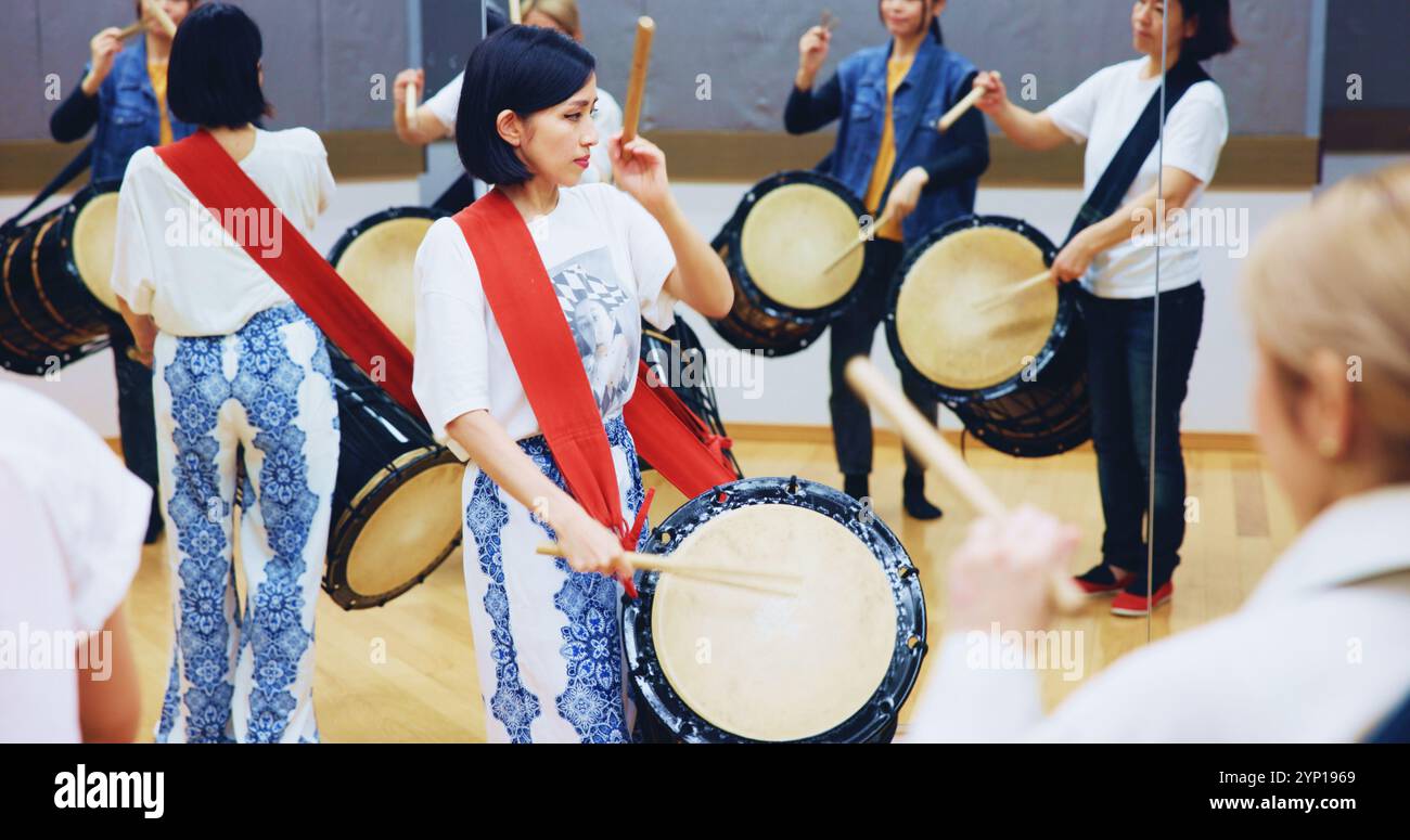 Japanese, learning or people with drums for music on instrument for ...