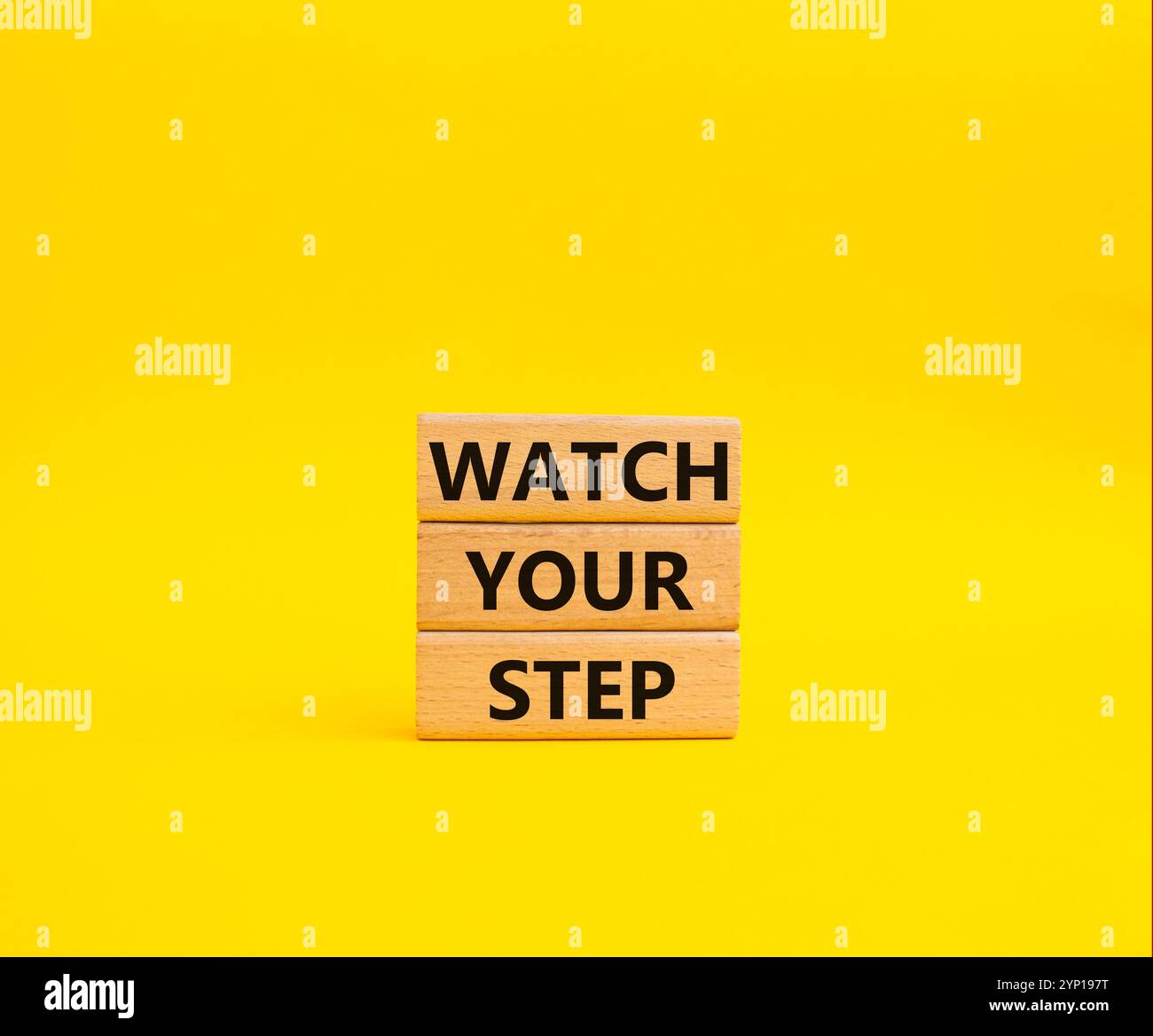 Watch your Step symbol. Concept words Watch your Step on wooden blocks ...