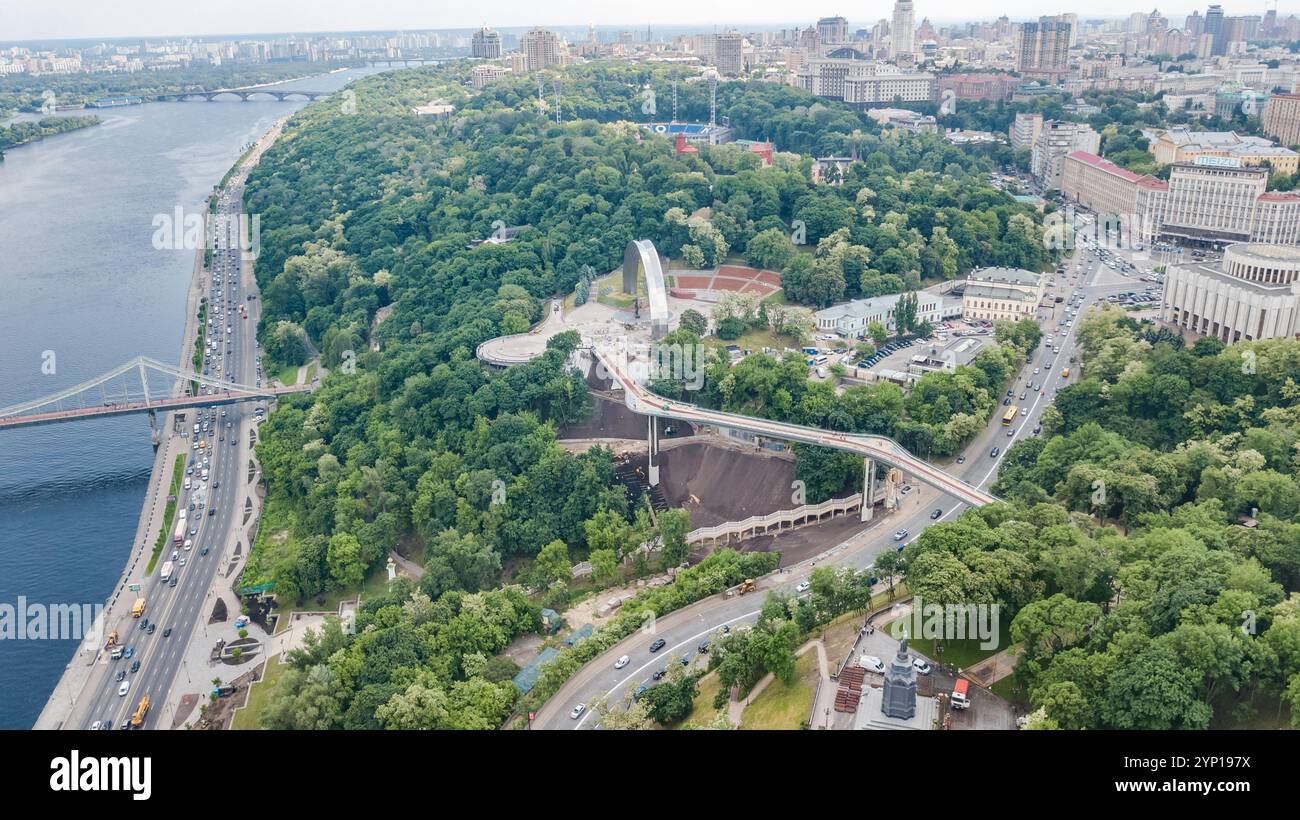 Aerial drone view of new pedestrian cycling park bridge construction ...