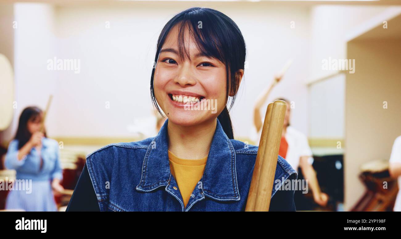 Portrait, smile and woman with drum sticks of teaching music, community ...