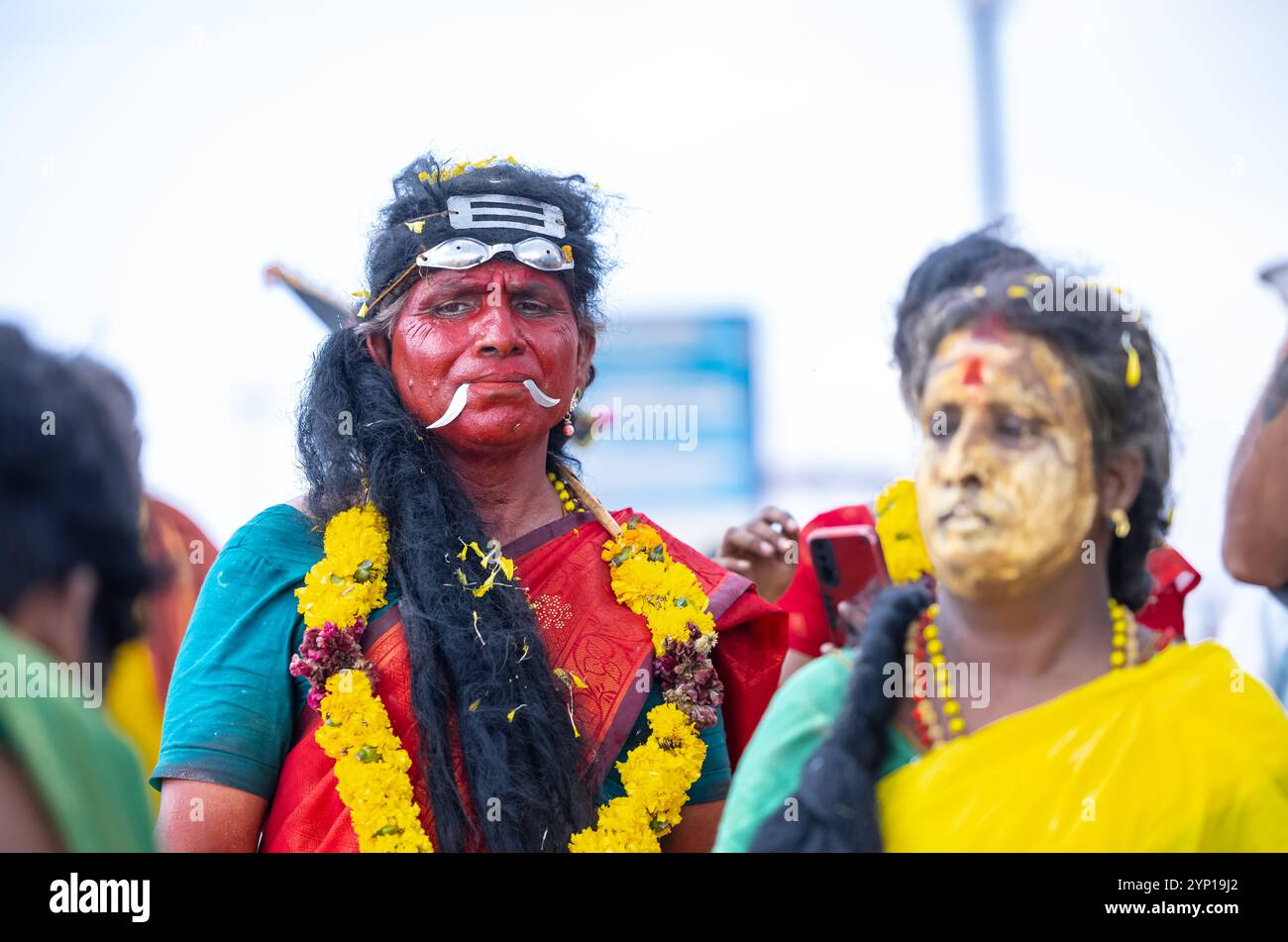 Kulasai, Portrait of indian hindu devotee with painted face and dressed ...
