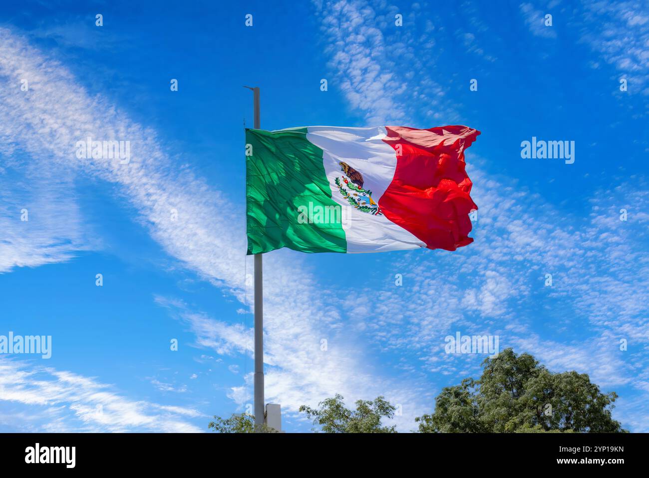Los Cabos, Mexico, Mexican tricolor national striped flag proudly ...