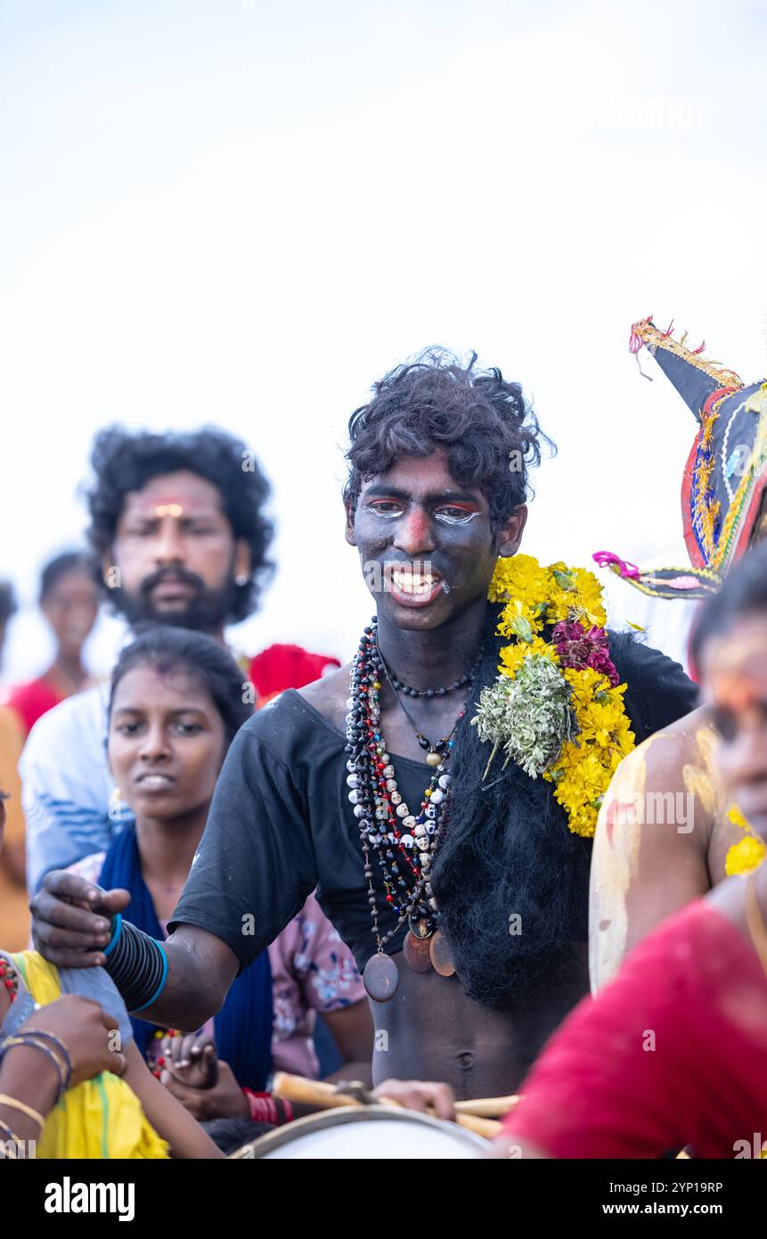 Kulasai, Portrait of indian hindu devotee with painted face and dressed ...