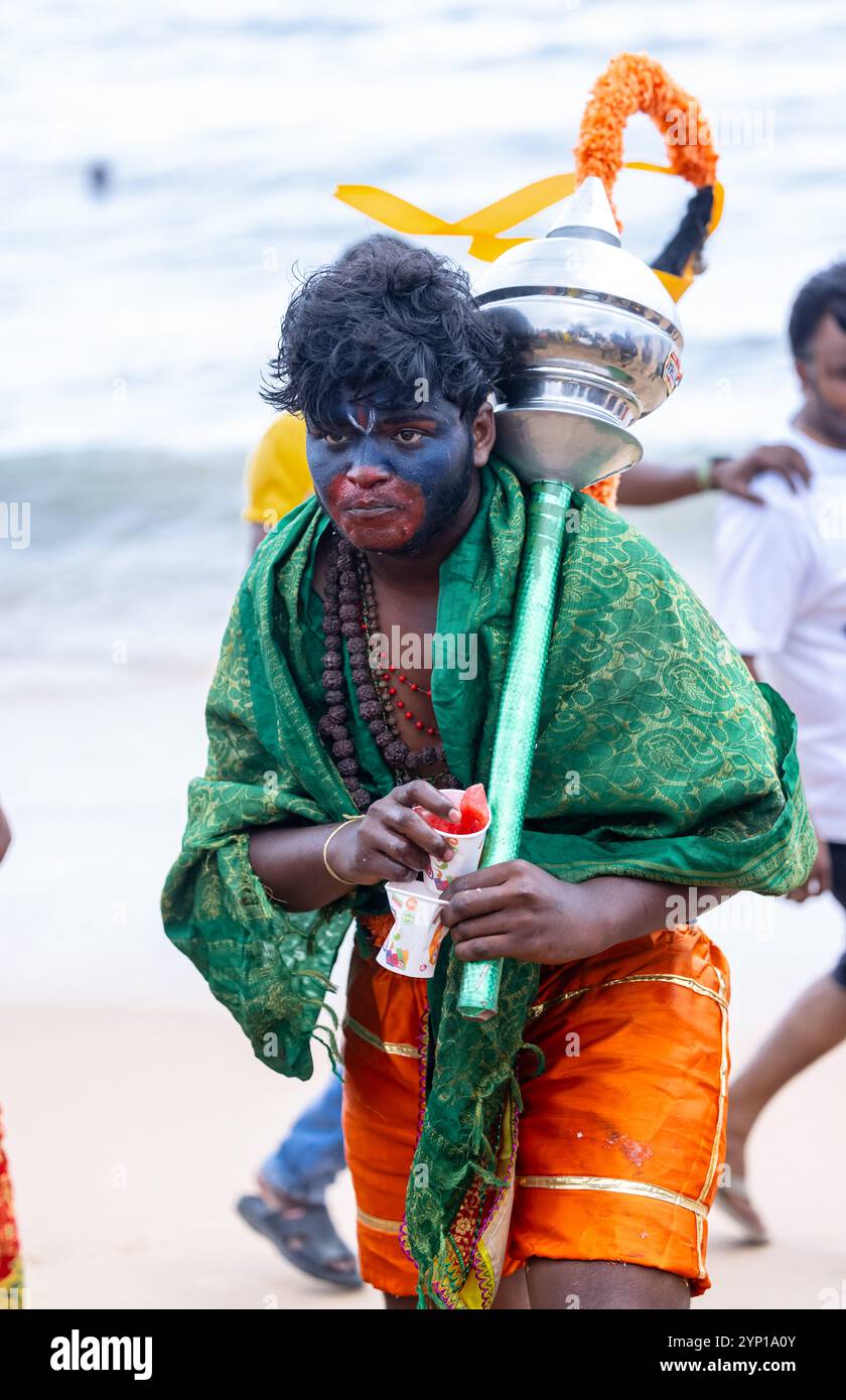 Kulasai, Portrait of indian hindu devotee with painted face and dressed ...