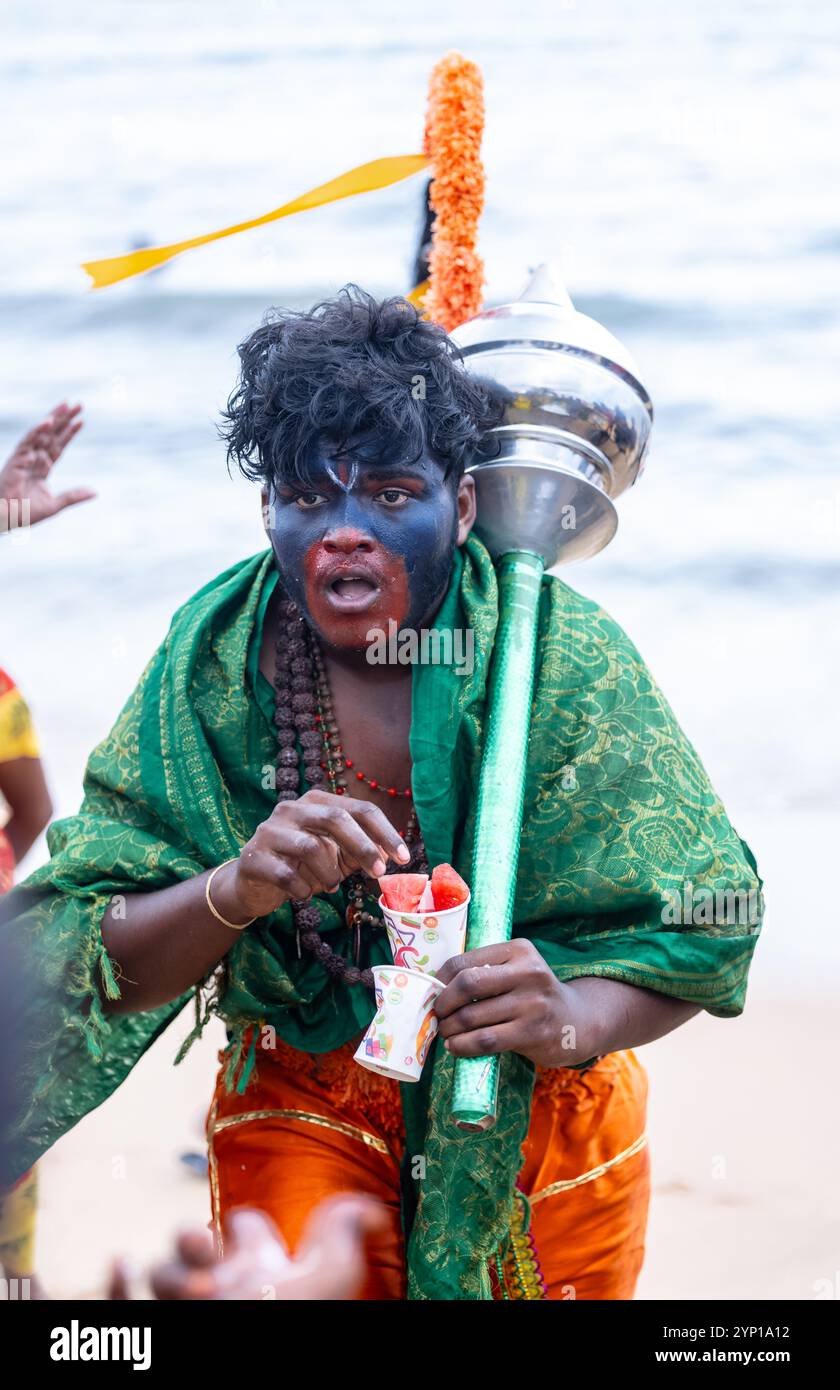 Kulasai, Portrait of indian hindu devotee with painted face and dressed ...
