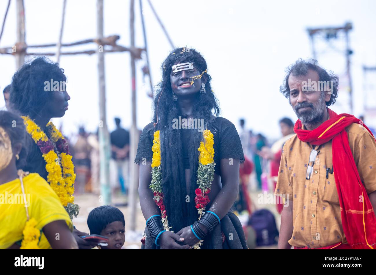 Kulasai, Portrait of indian hindu devotee with painted face and dressed ...
