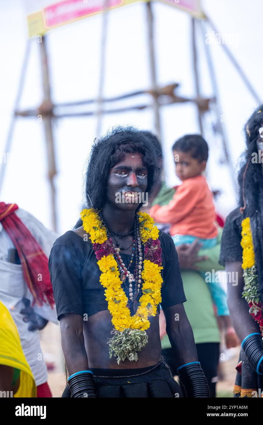 Kulasai, Portrait of indian hindu devotee with painted face and dressed ...