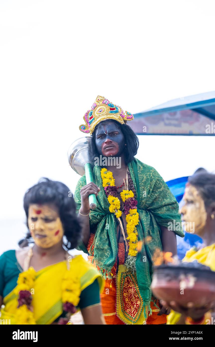 Kulasai, Portrait of indian hindu devotee with painted face and dressed ...
