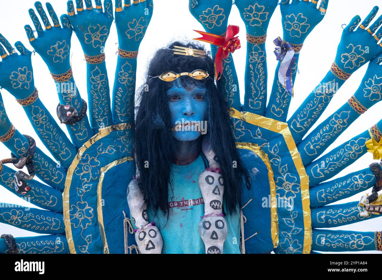 Kulasai, Portrait of indian hindu devotee with painted face and dressed ...