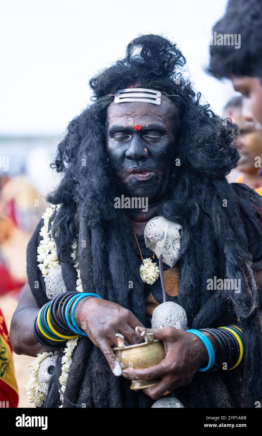 Kulasai, Portrait of indian hindu devotee with painted face and dressed ...